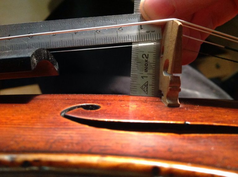 Raising the Projection – Triangle Strings