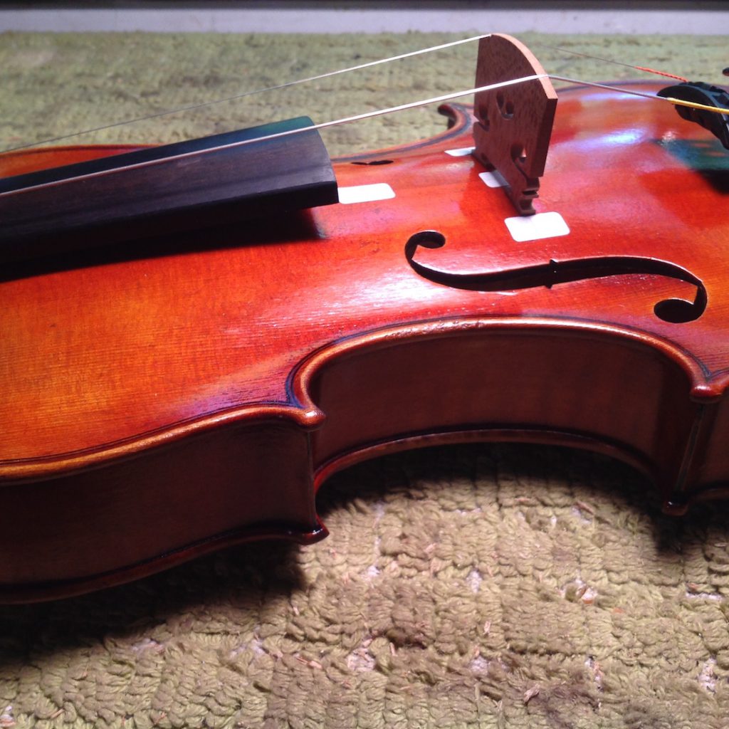 Carving A Violin Bridge – Triangle Strings